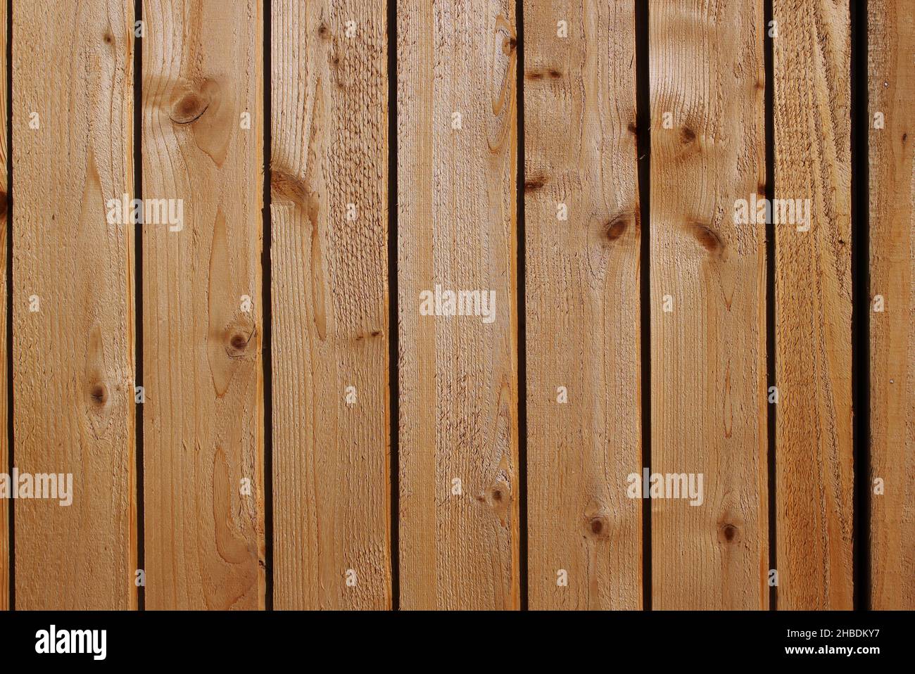 Fresh cut pine wood planks on a wall Stock Photo - Alamy