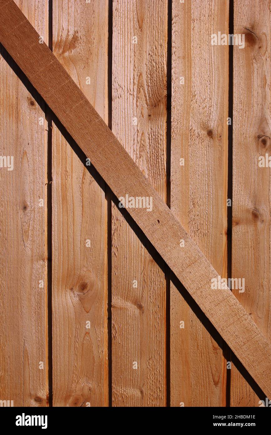 Fresh cut pine wood planks on a wall Stock Photo - Alamy