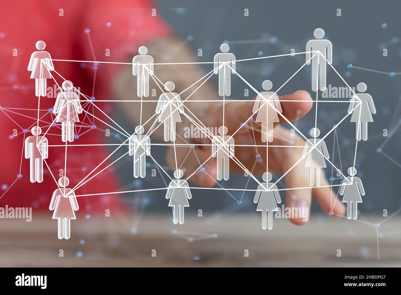 A woman touching human figures connected with communication lines and ...