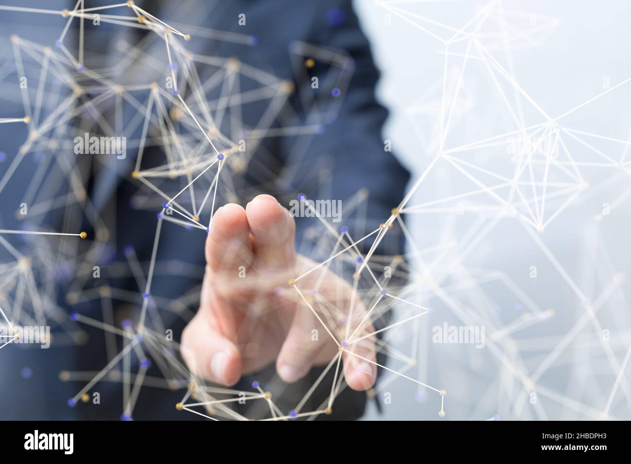 A businessman touching communication lines connected with dots Stock ...