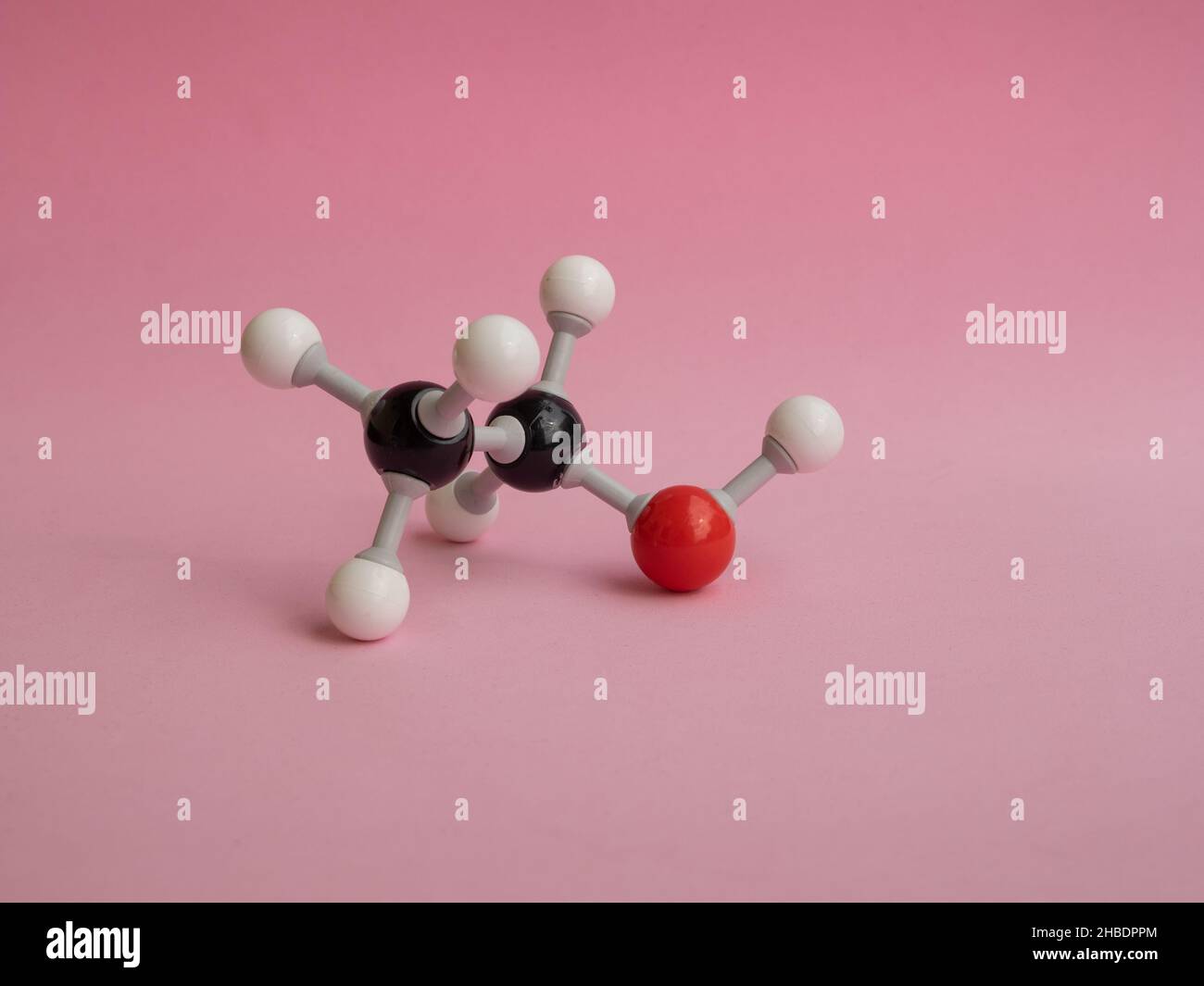 A molecular atom model isolated on a pink background Stock Photo - Alamy