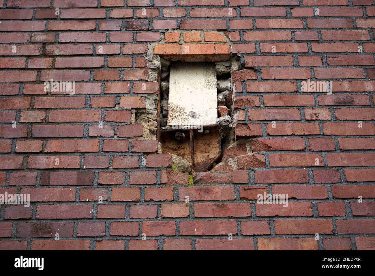 A closeup of a broken part of a brick wall Stock Photo - Alamy