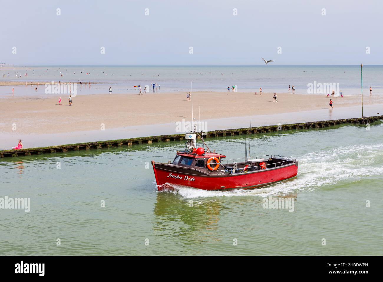 Small red fishing trip boat Jenifer's Pride enters the River Arun by ...
