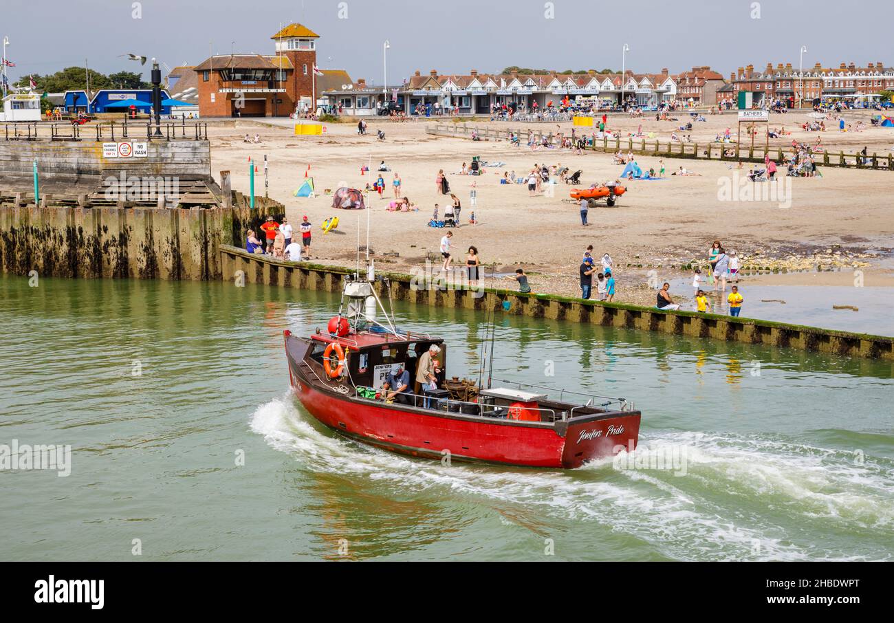 Small red fishing trip boat Jenifer's Pride enters the River Arun by ...
