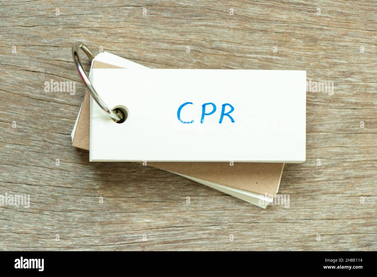 Flash card with handwriting word CPR (abbreviation of Cardiopulmonary ...