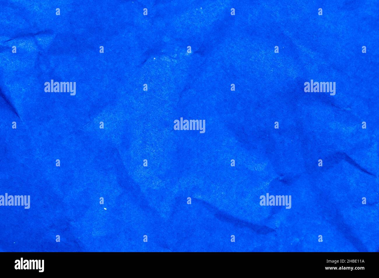 Grunge wrinkled blue color paper textured background Stock Photo - Alamy