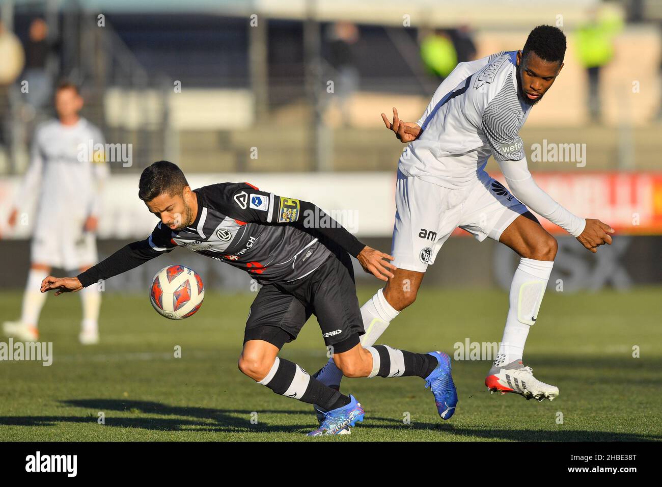 Jonathan Sabbatini (#14 FC Lugano) and Jordan Siebatcheu (#17 Young ...