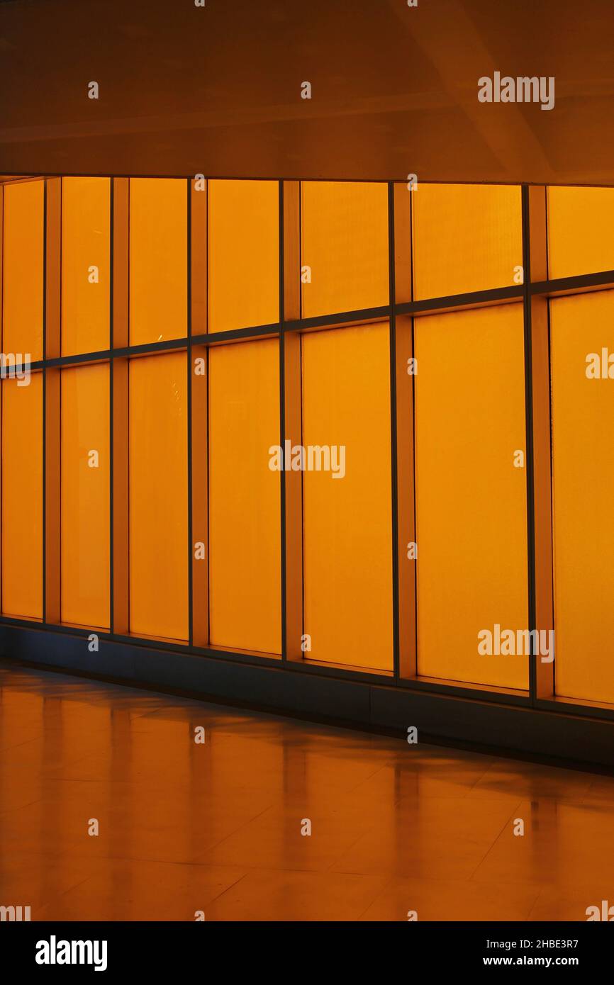 A modern building with orange windows Stock Photo - Alamy