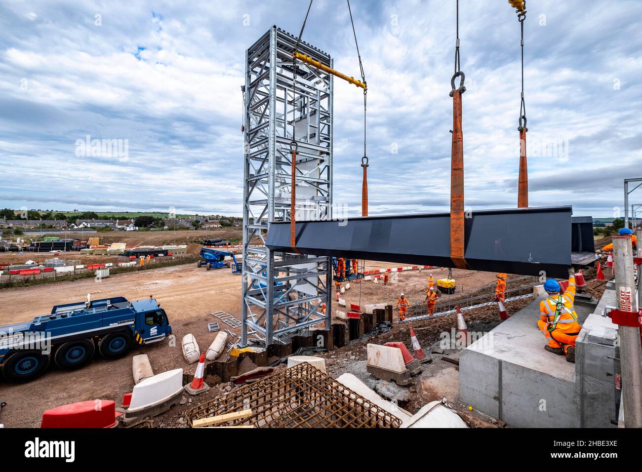Railway workers building new railway and knocking down bridges Stock ...