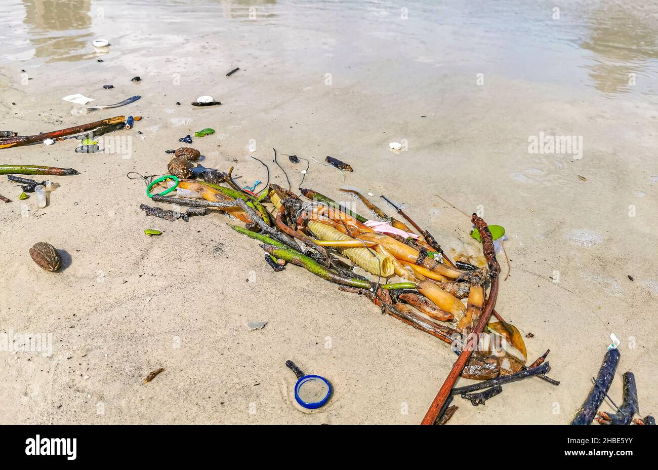 Stranded washed up plastic garbage waste and trash pollution on the ...