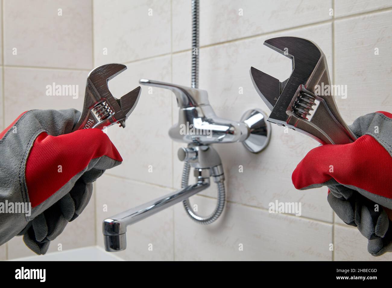 Preparing for the repair of a worn out shower valve switch Stock Photo ...