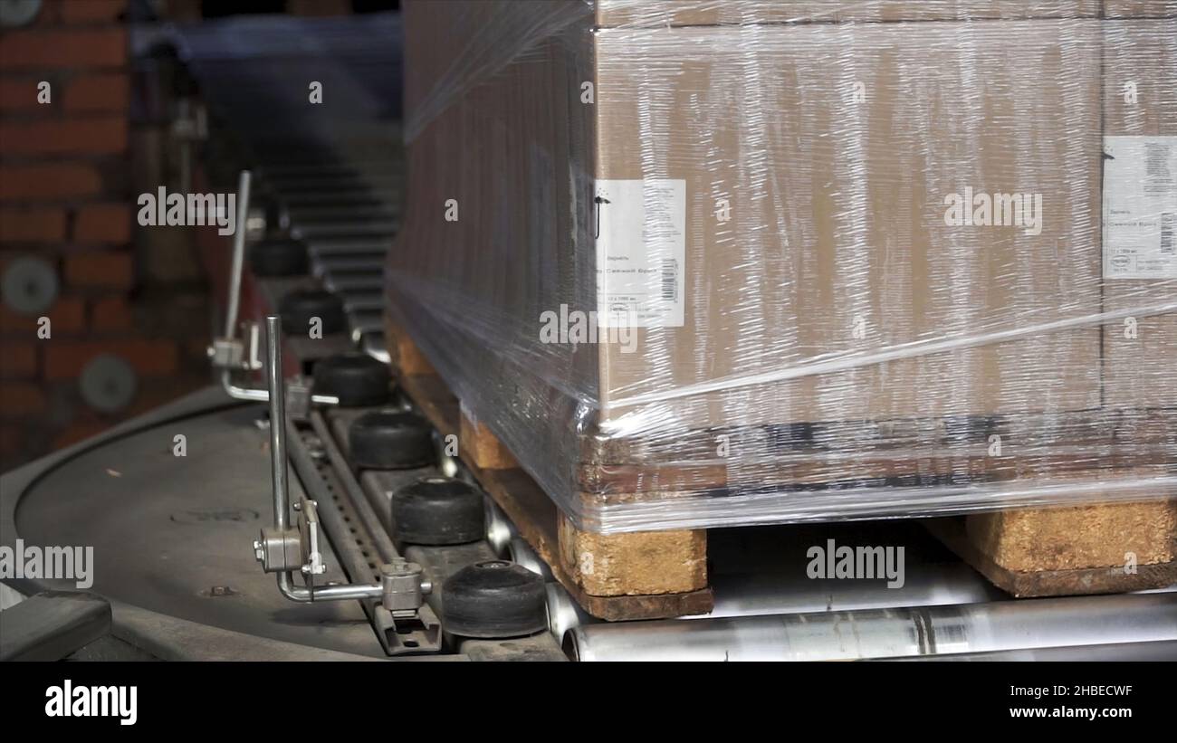 Conveyer roller sorting system in distribution warehouse. Clip. Modern ...