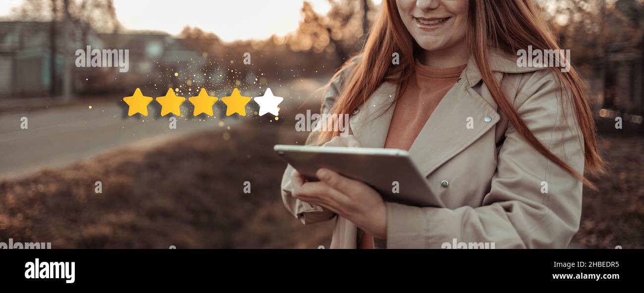 Customer review good rating concept. Excellent. Person using tablet ...