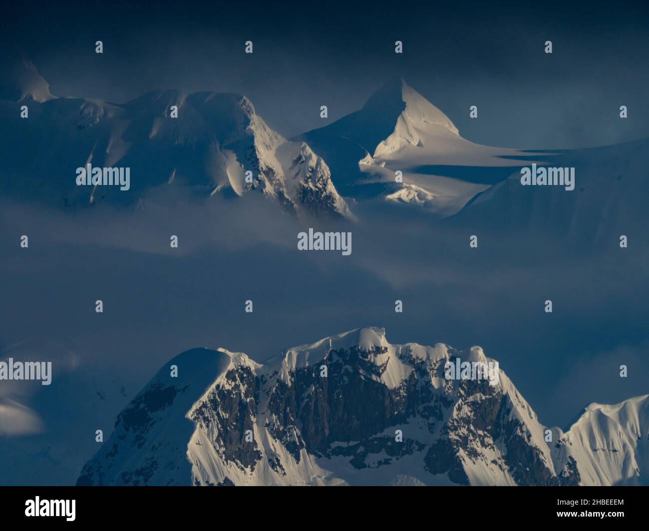 Stunning views of tall ice covered mountains along the Antarctic ...