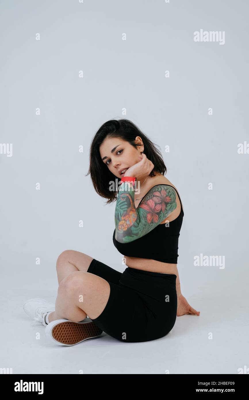 Beautiful Young Female Model in Isolated Studio Setting Stock Photo - Alamy