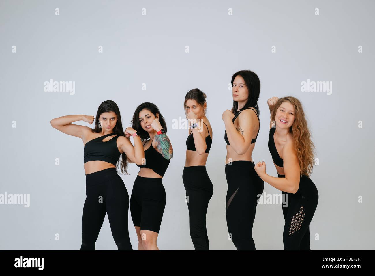 diverse models laughing, enjoying time together, look at camera Stock ...