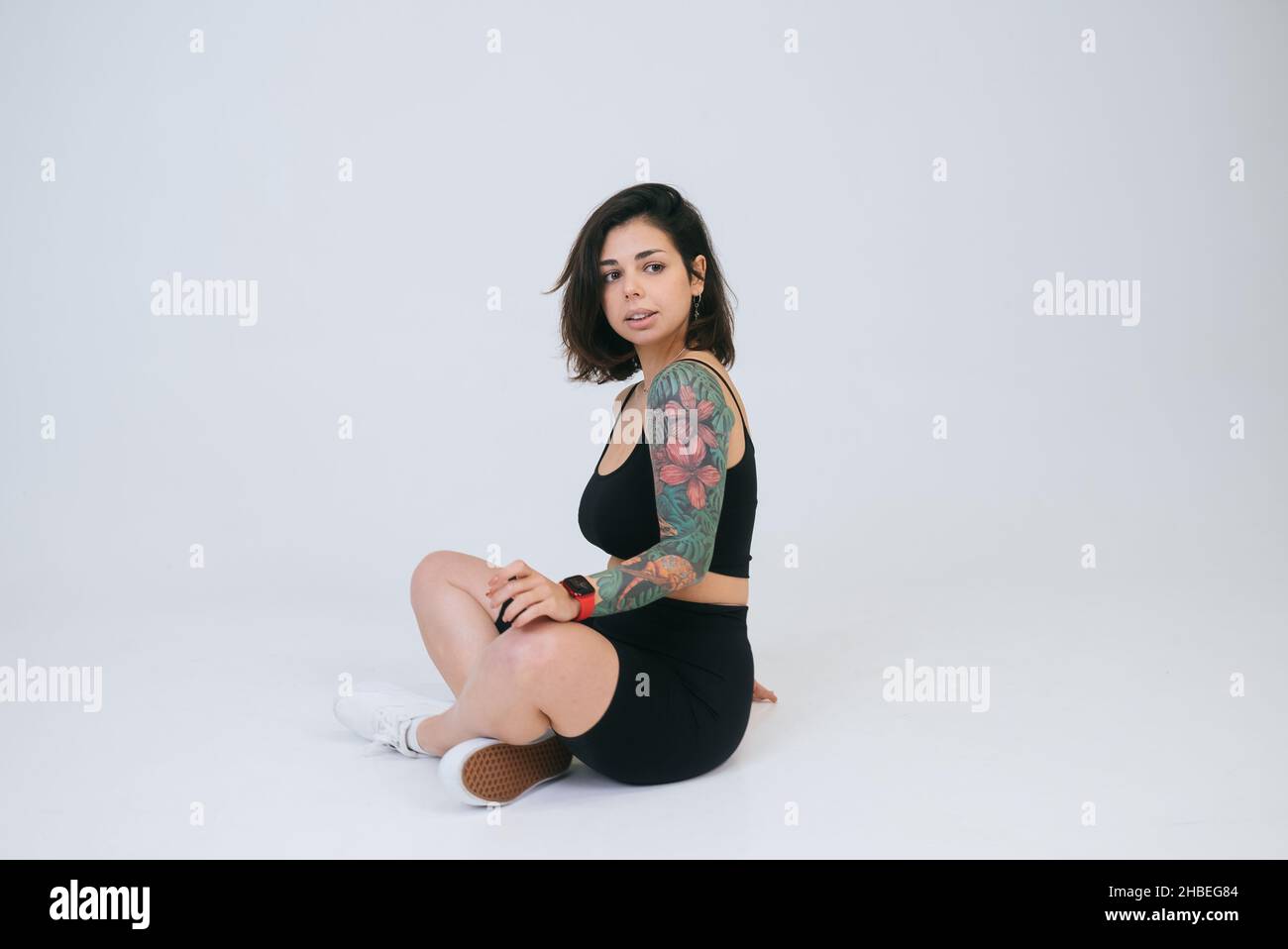 Beautiful Young Female Model in Isolated Studio Setting Stock Photo - Alamy