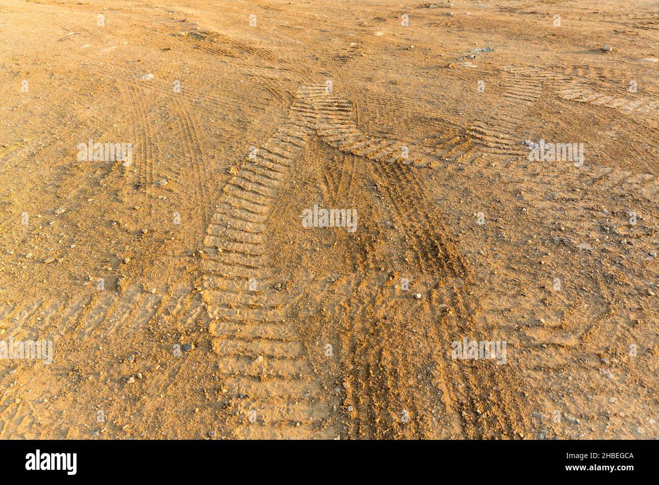 Truck tire track imprints in a dirty lot Stock Photo - Alamy
