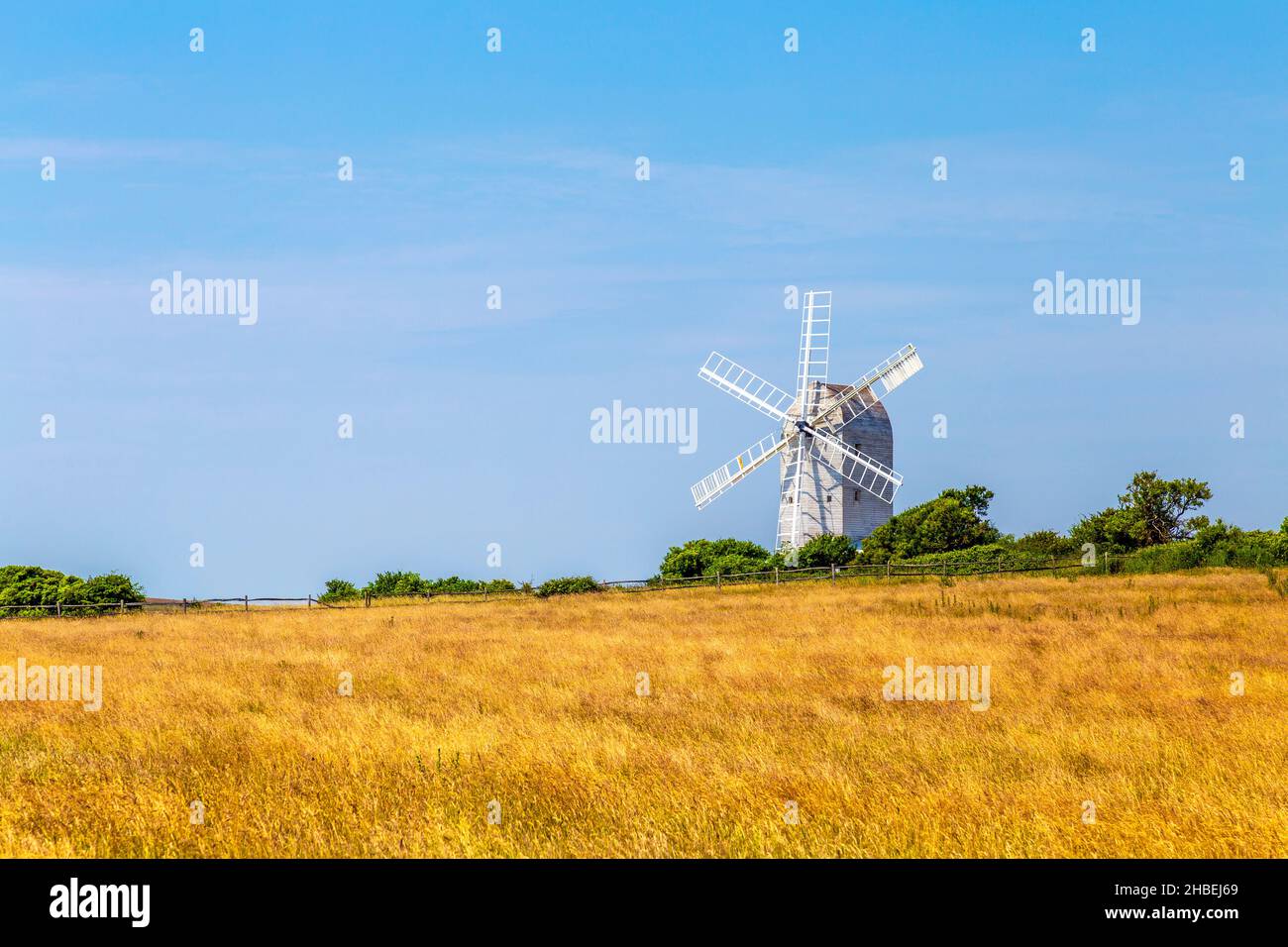 White wooden windmill in a field - Ashcombe Windmill in Kingston near ...
