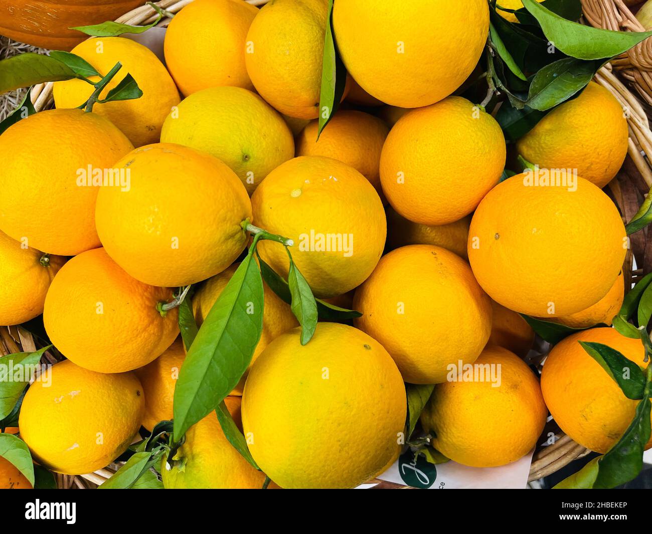 A stack of fresh lemon at a supermarket stall. Organic lemons Stock ...