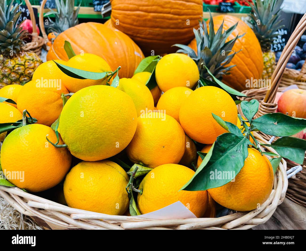 A stack of fresh lemon at a supermarket stall. Organic lemons Stock ...
