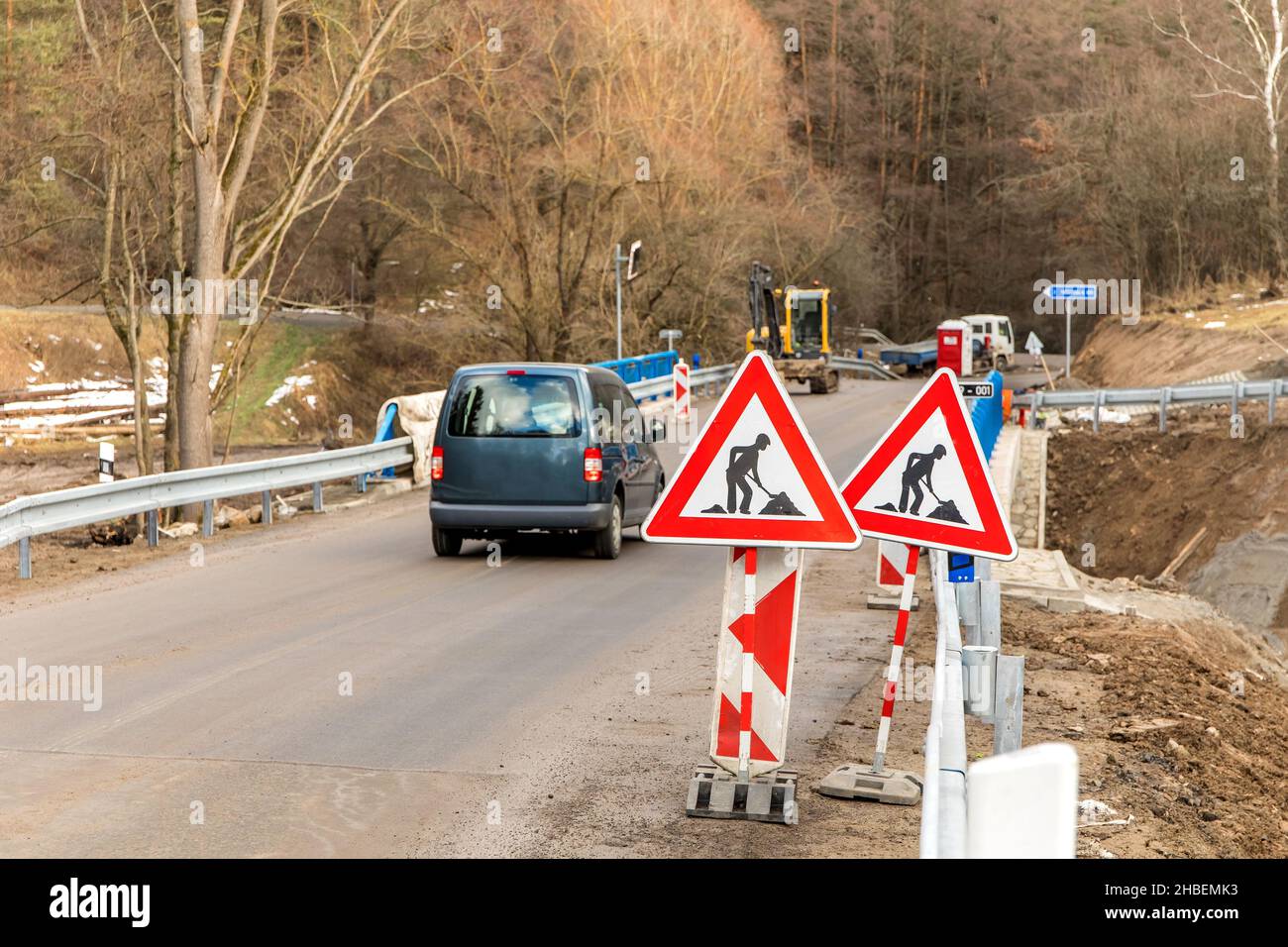 Road sign work on the road. Finishing work on the construction of a ...