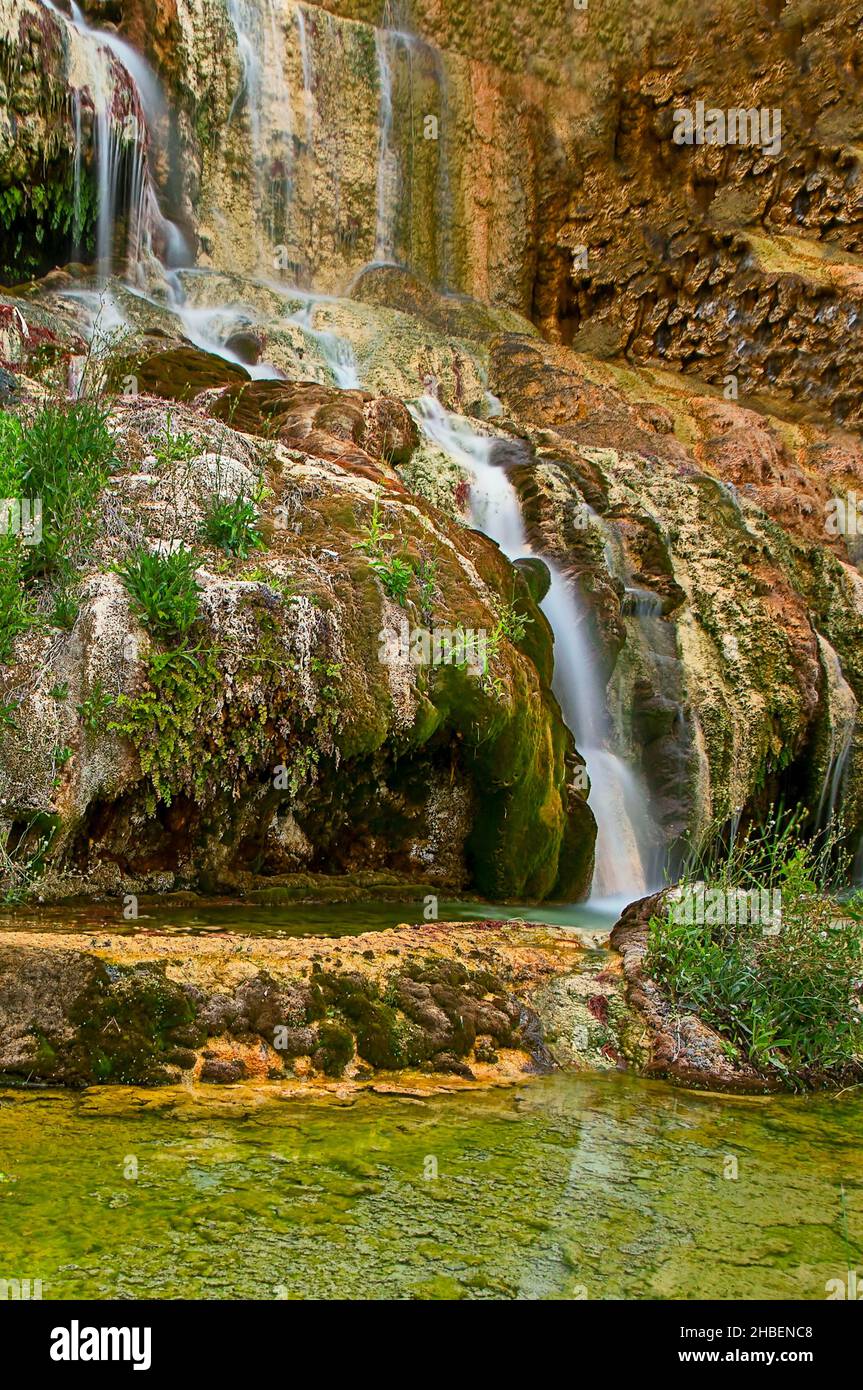 Thermal water cascade in the natural aqueduct of Villanueva Stock Photo ...