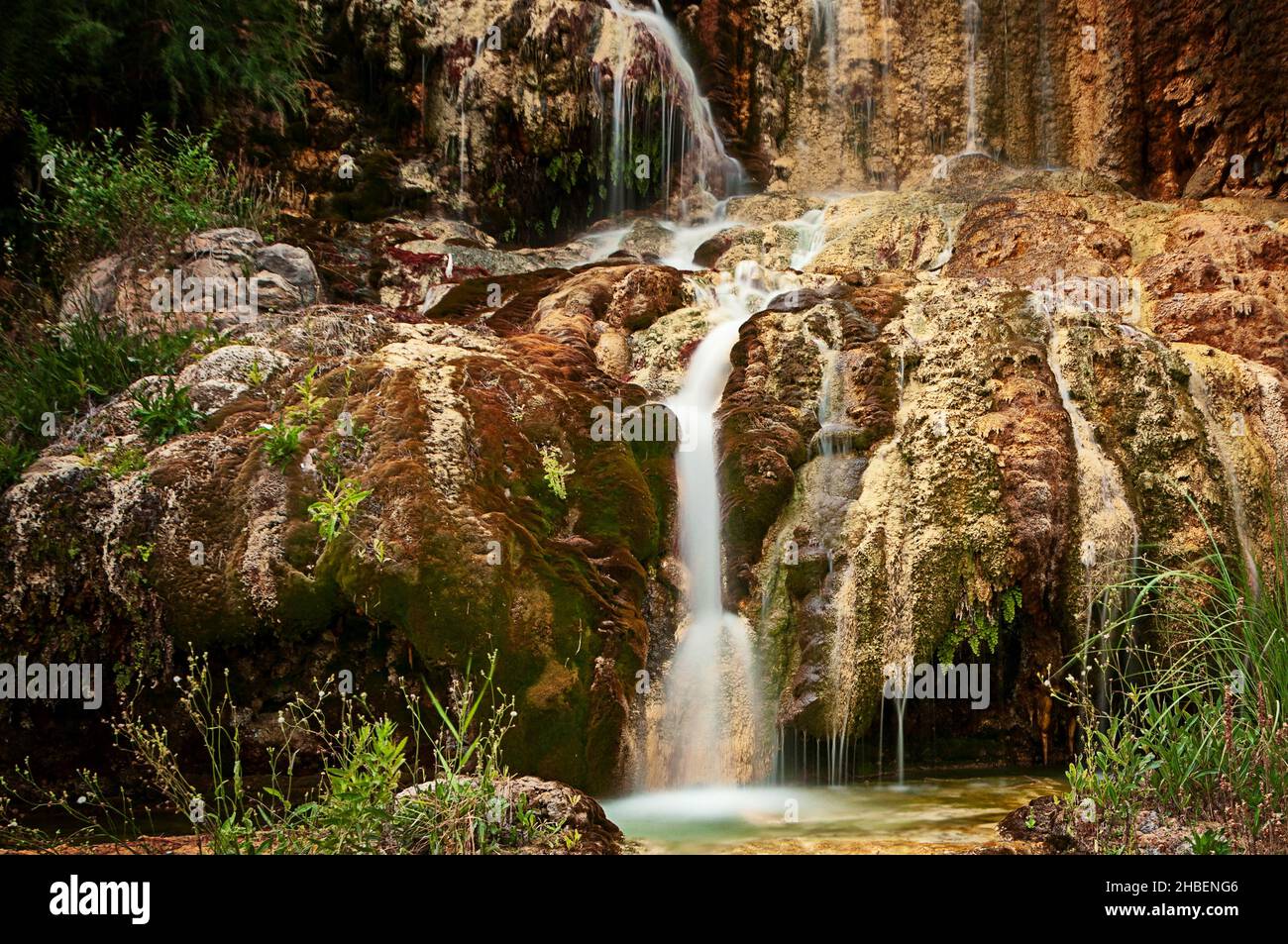Thermal water cascade in the natural aqueduct of Villanueva Stock Photo ...
