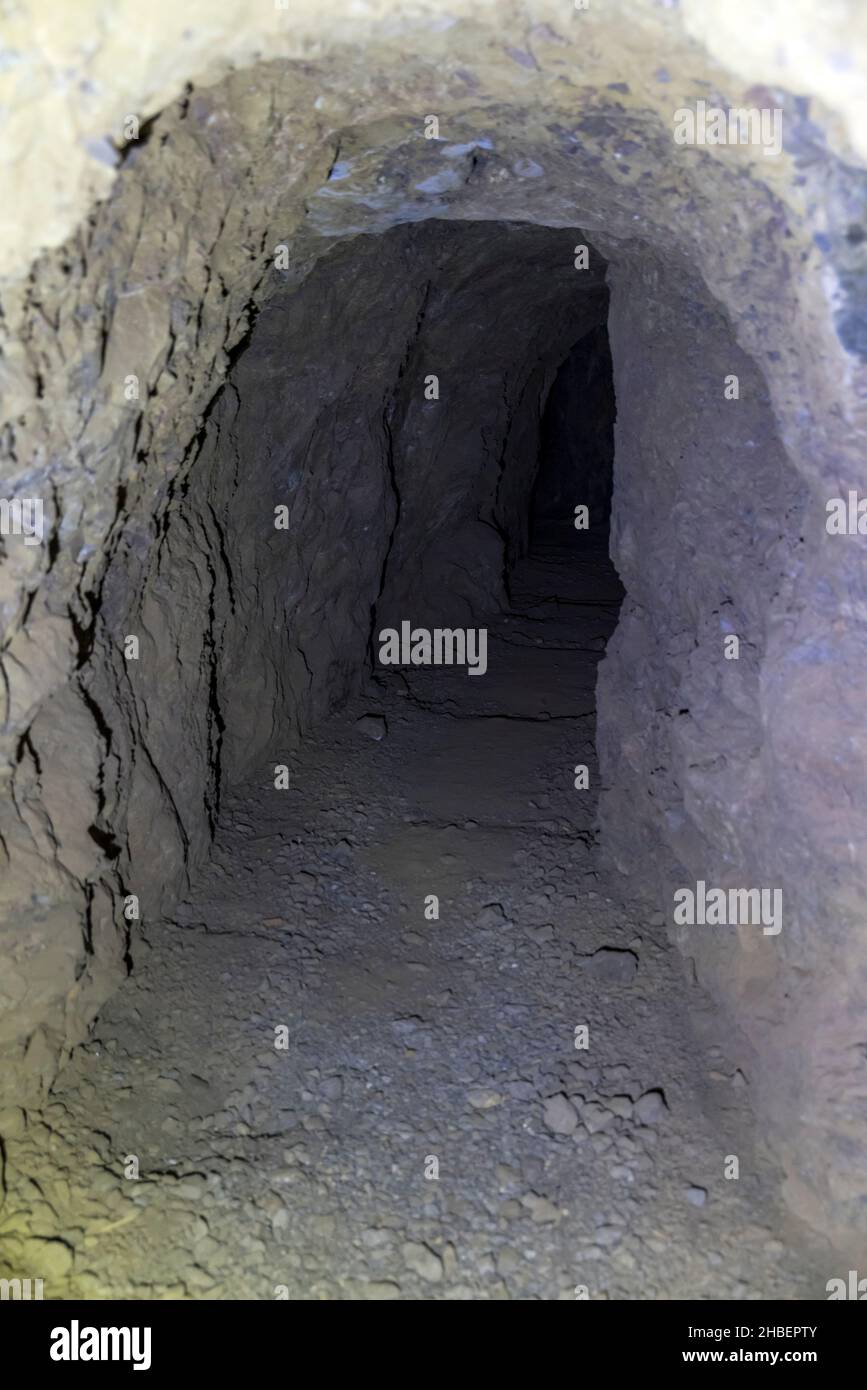 Mining tunnel bores through rock. Mine shaft for ore recovery Stock ...