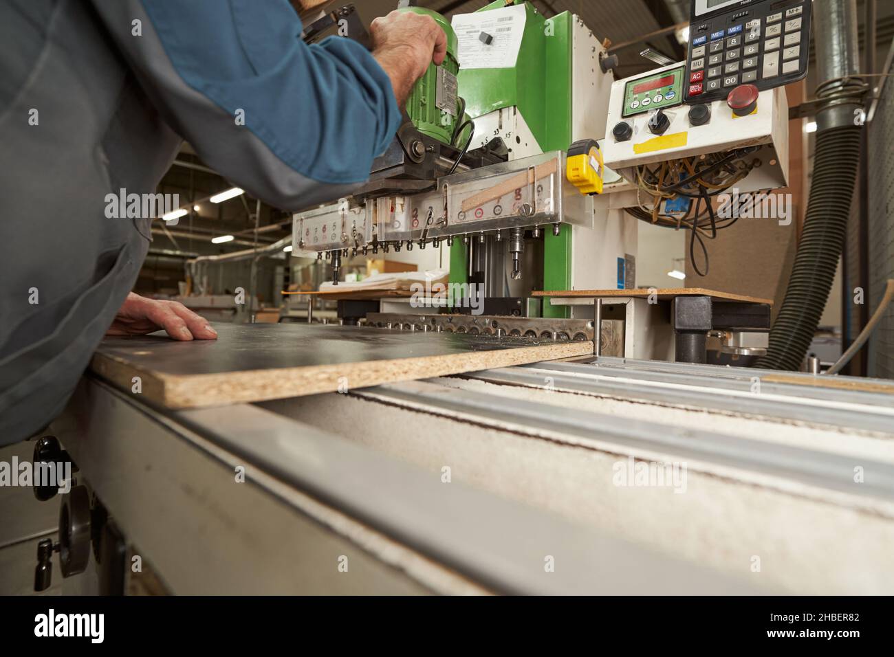 Carpenter processing furniture polishing machine hi-res stock ...