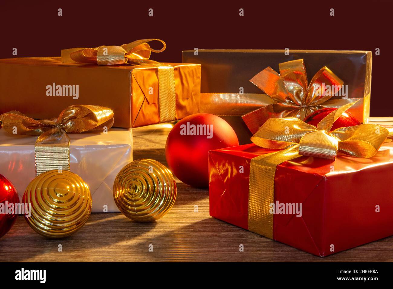 Christmas gift table with presents and Christmas tree baubles Stock ...