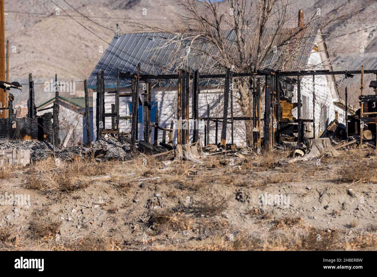 Charred remains of a shed left over after a fire Stock Photo - Alamy