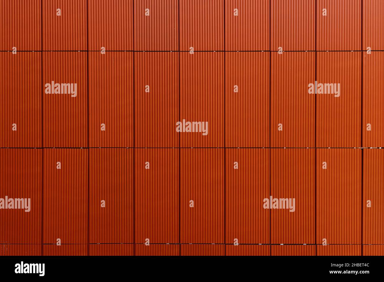 Modern facade of extruded ceramic panels. Ventilated facade made of ...