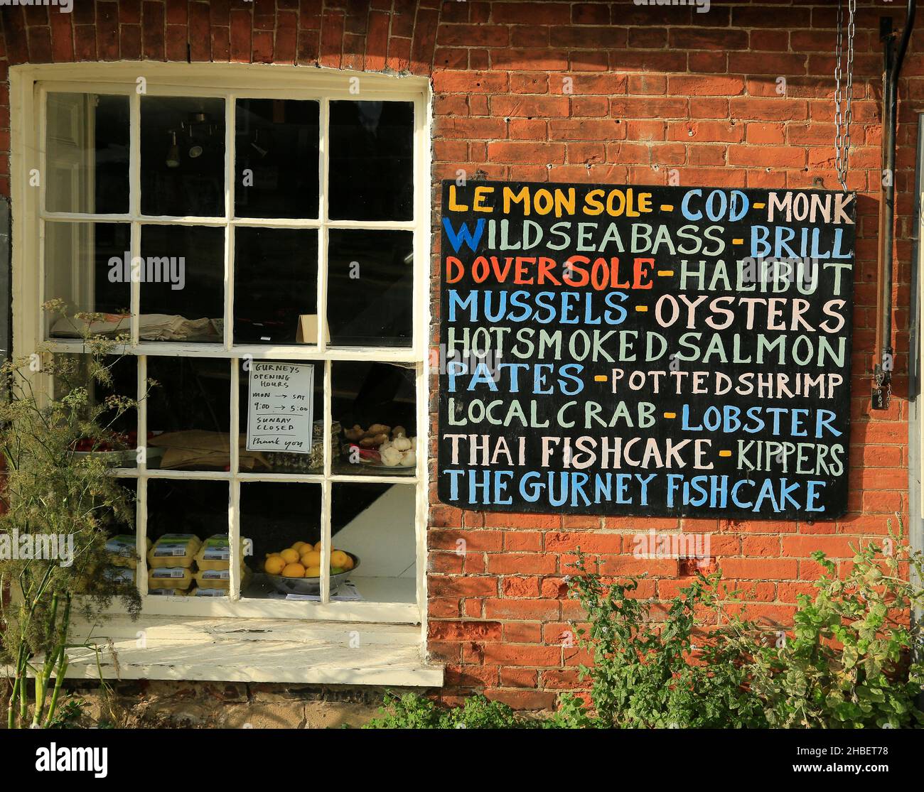 Fishmonger signs, outside fish shop in Norfolk, England Stock Photo - Alamy