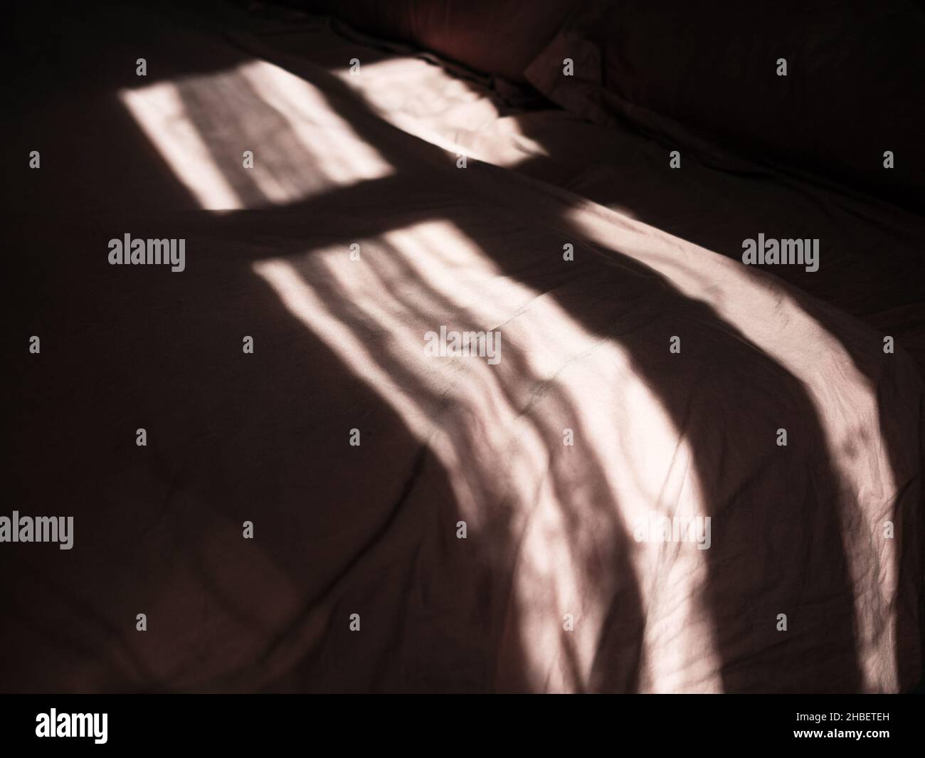 Beautiful shadow from the window on bed from the morning sun Stock ...