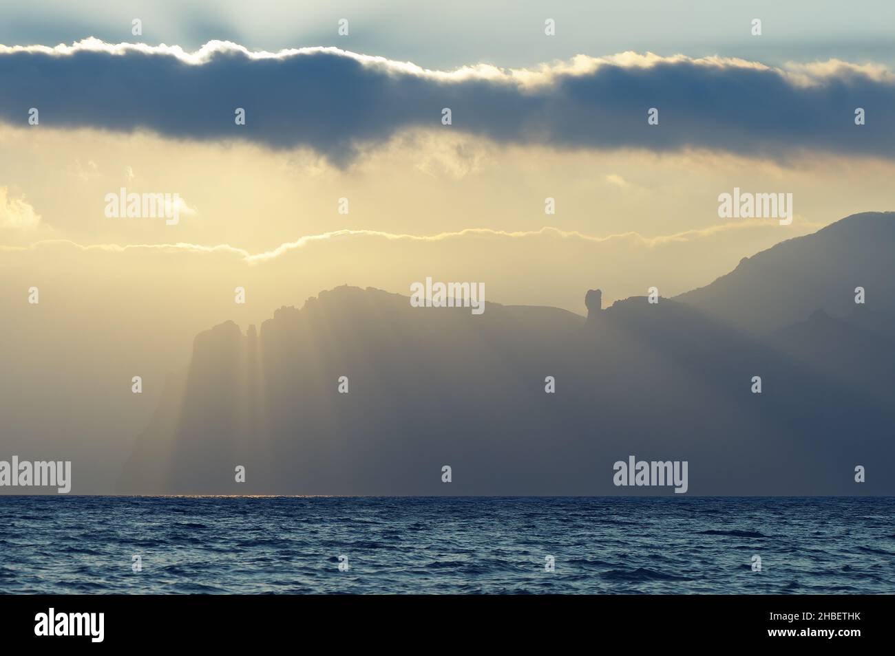 Seascape with beautiful sunshine. Rock on the coast. The peninsula of ...