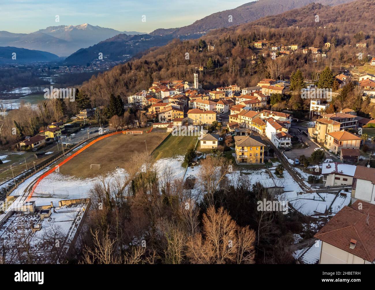 Aerial view of small Italian village Ferrera di Varese at winter season ...