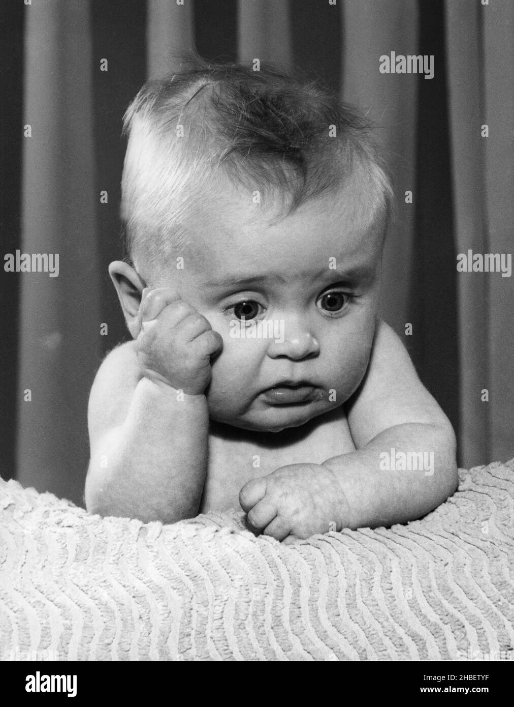 Leaning on hand Black and White Stock Photos & Images - Alamy