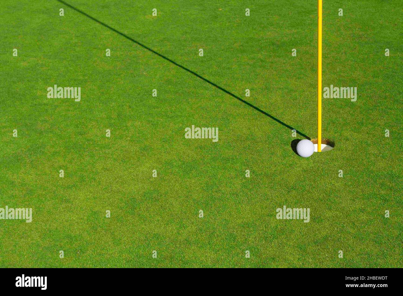 Close-up of Golf Course Green, Flag Pin and Ball Stock Photo - Alamy