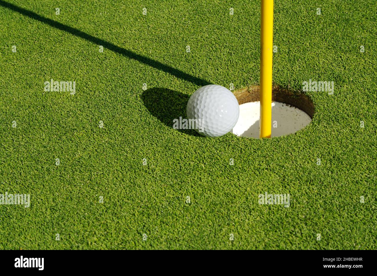Close-up of Golf Course Green, Flag Pin and Ball Stock Photo - Alamy