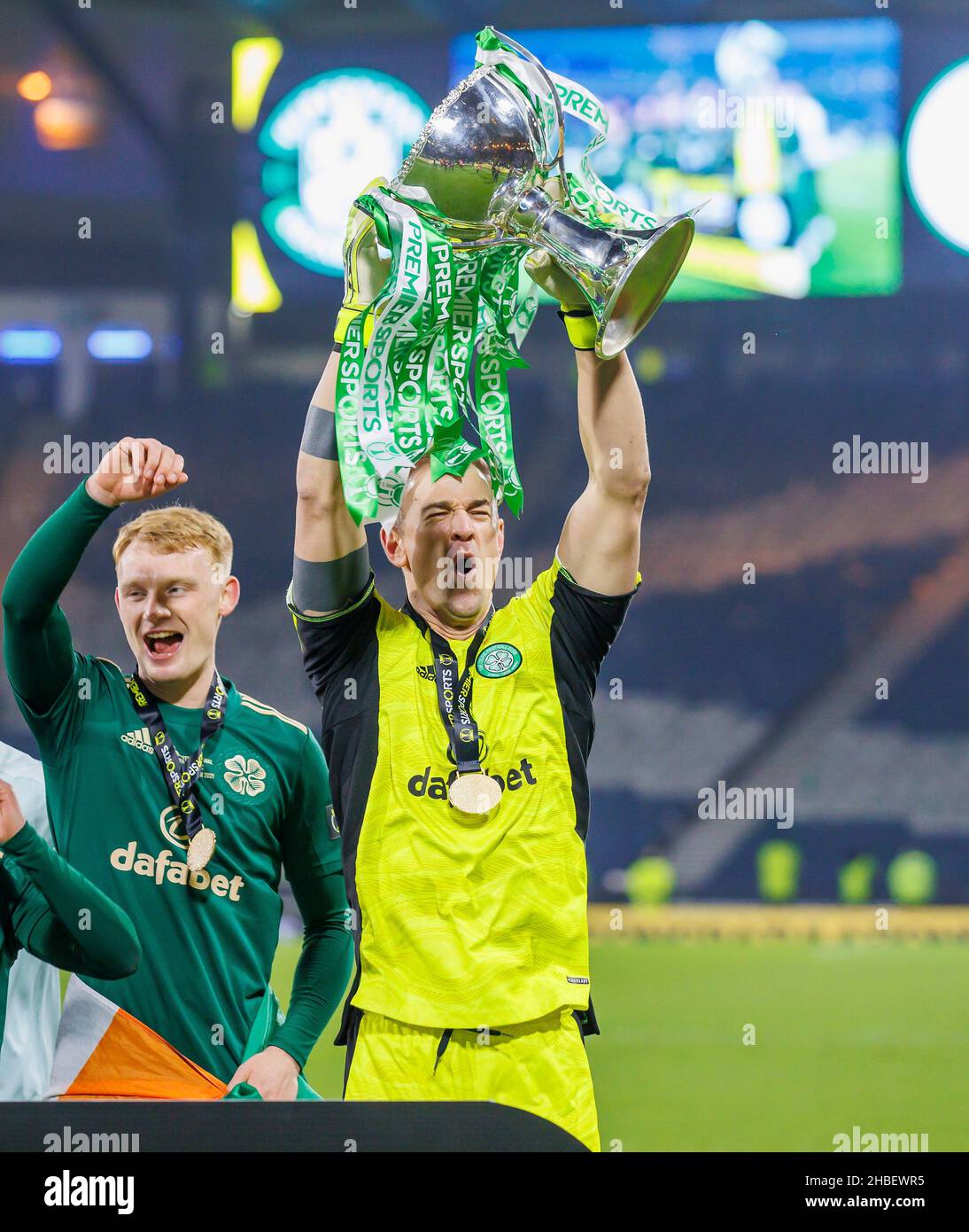 Celtic goalkeeper Joe Hart celebrates with the trophy after the Premier ...