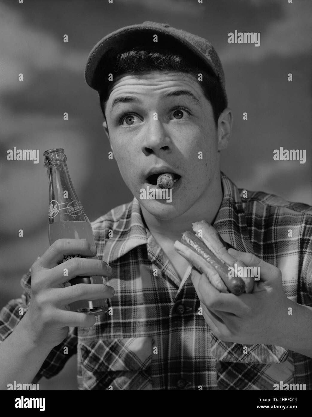 Teen drinking soda bottle Black and White Stock Photos & Images - Alamy