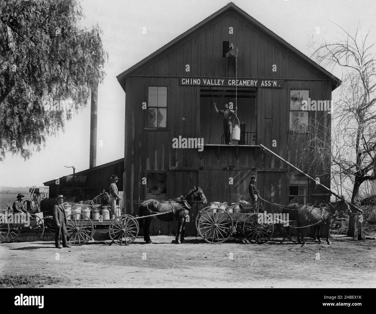 Two Horse drawn carts waiting to be loaded or unloaded for distribution ...