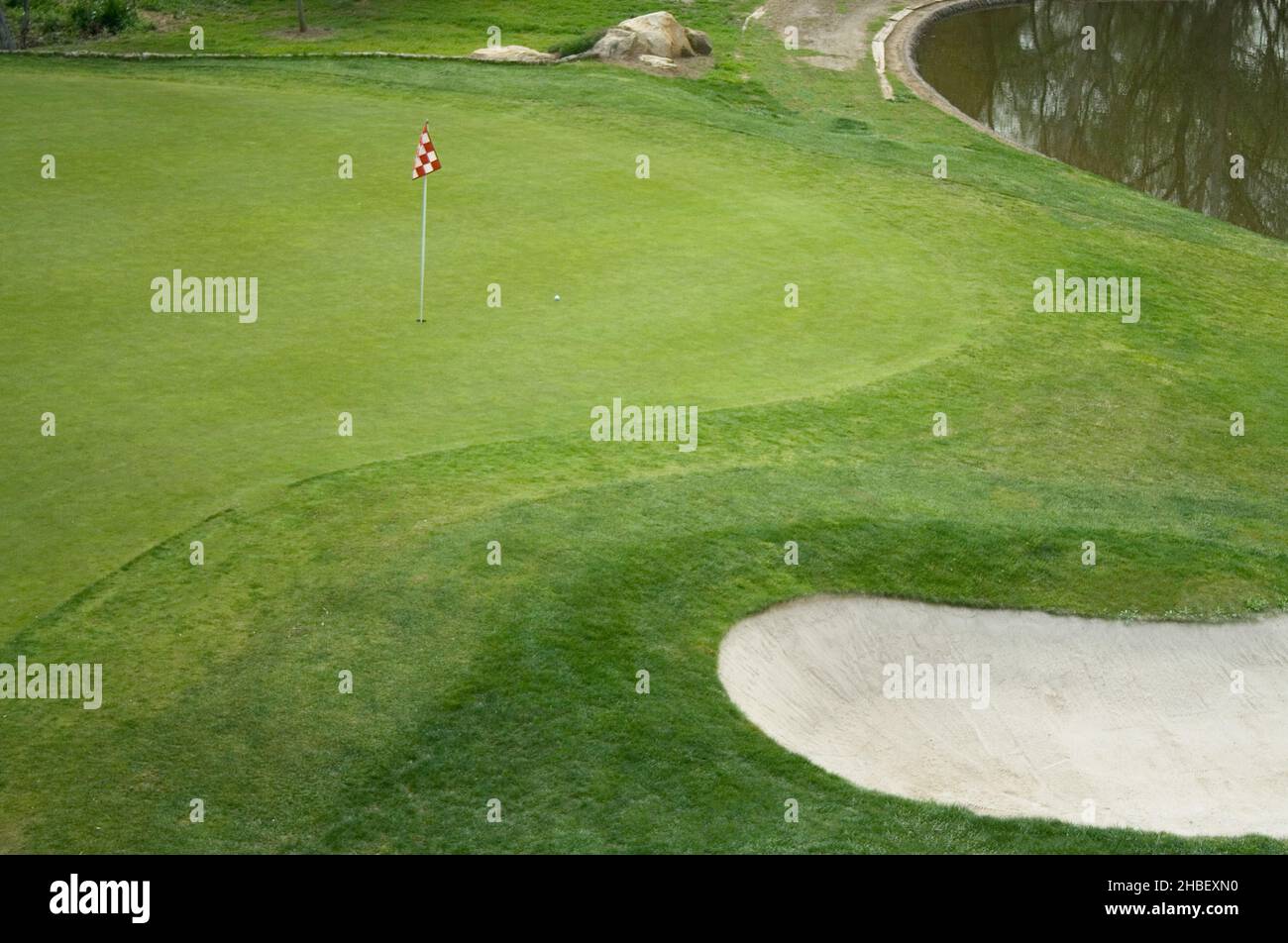 Scenic Grassy Golf Course Green and Flag Stock Photo - Alamy