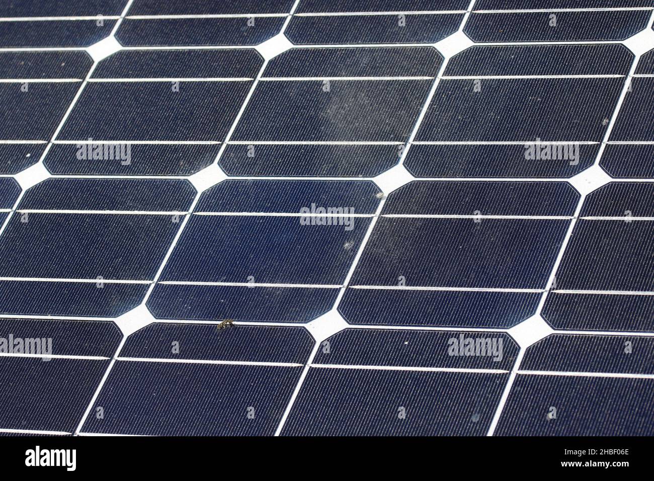 Roof mounted solar photo voltaic electric generator cell panel in close ...