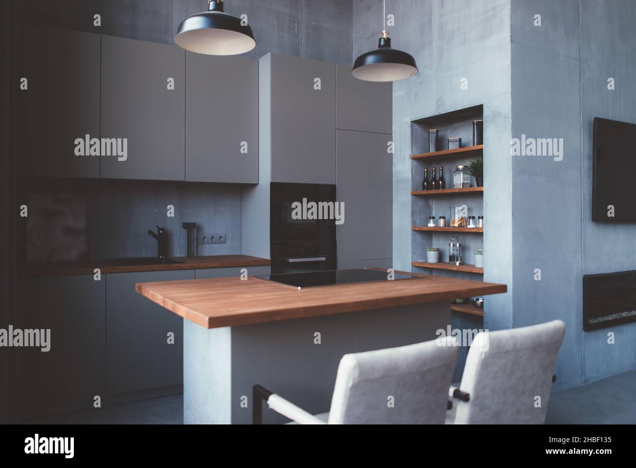 Modern kitchen interior design with furniture and table Stock Photo - Alamy