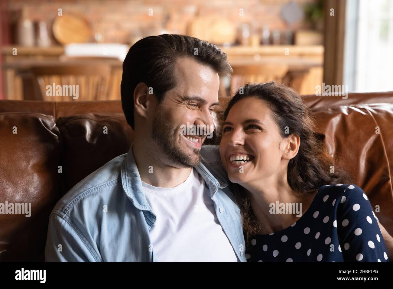 Happy loving family couple enjoying pleasant conversation Stock Photo ...