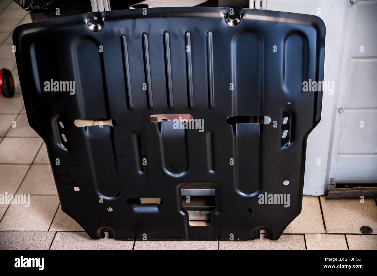 New car engine crankcase and gearbox protection on the floor of car ...