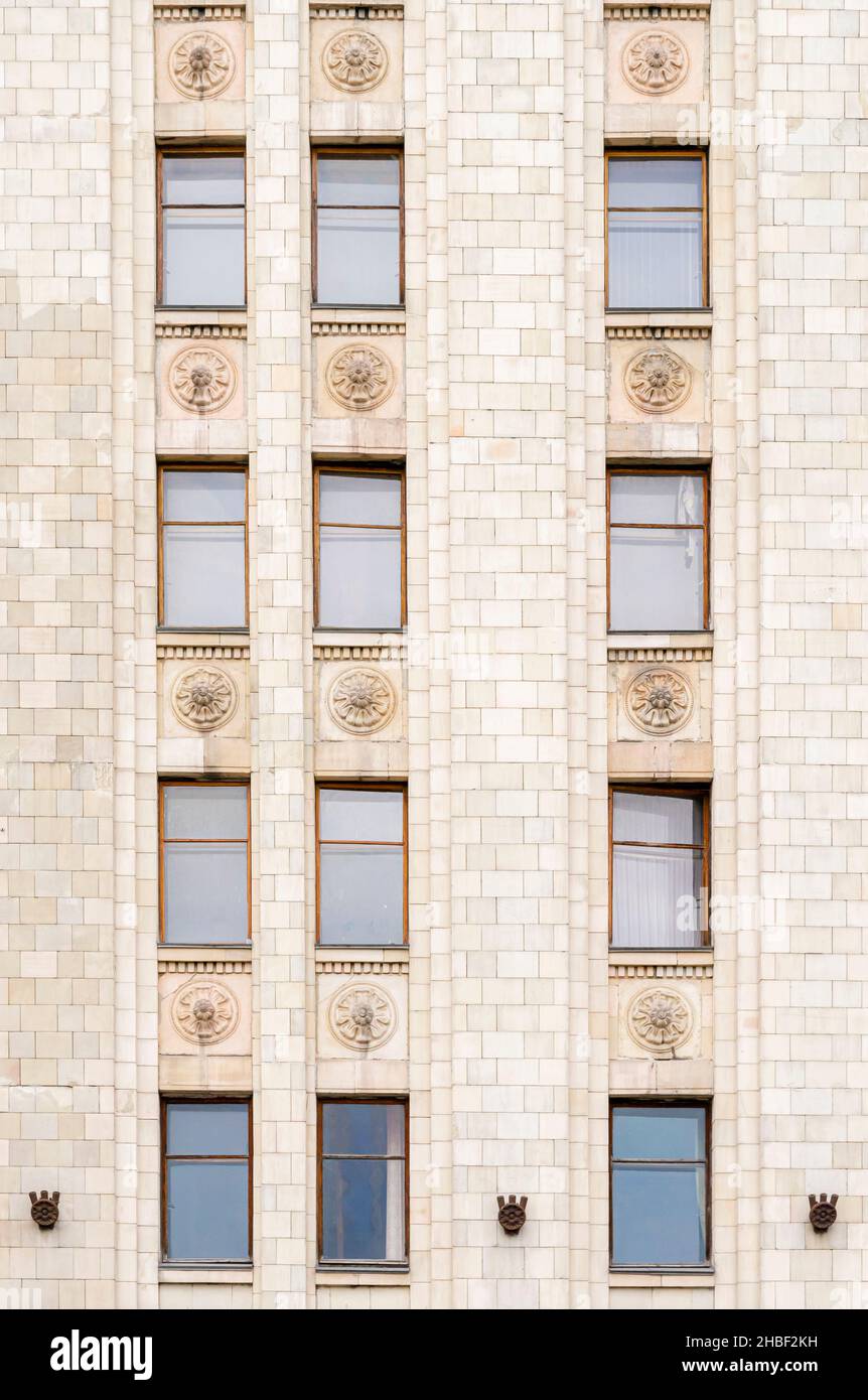 Rows of windows on neoclassicist building. Stalinist architecture ...
