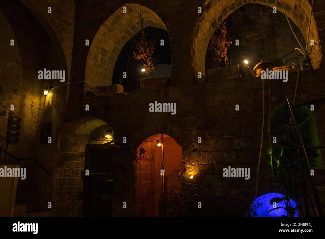 light decorations and christmas trees during new year celebration in ...